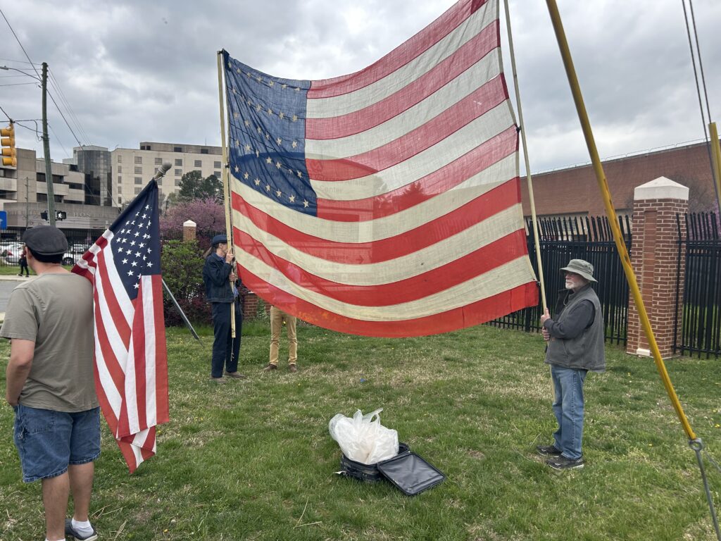 Protesters rally at the Durham VA to fight against proposed budget cuts ...