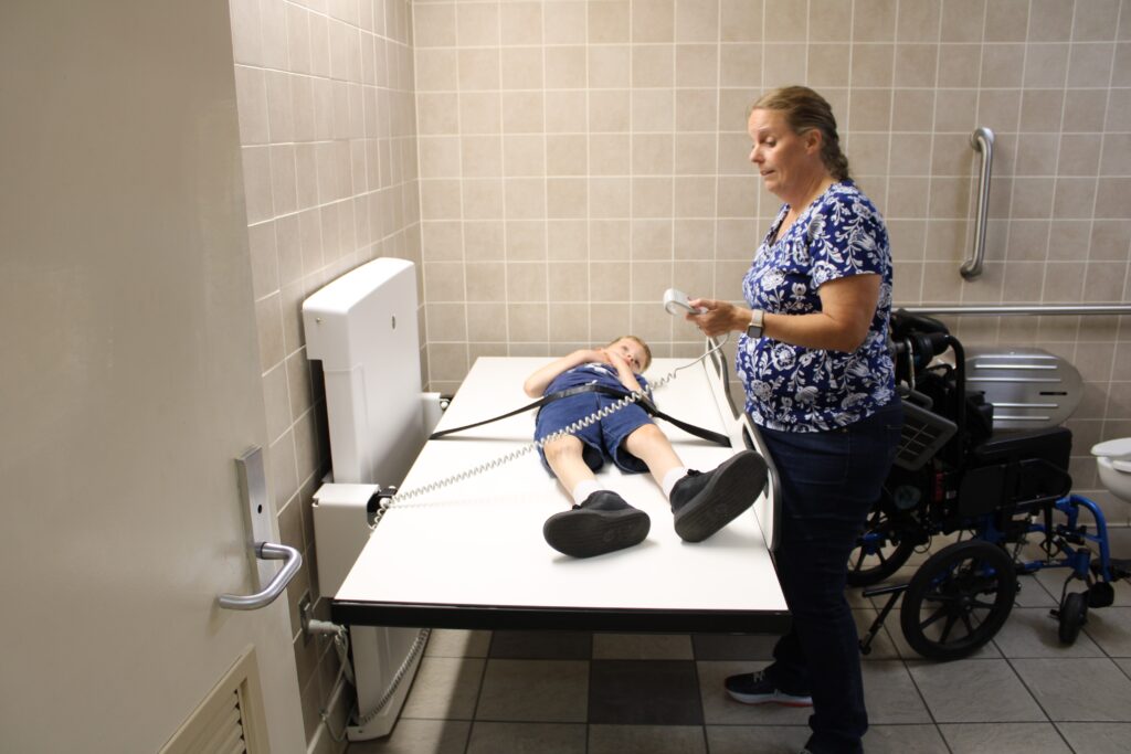 More restrooms have adult-size changing tables to help people with ...