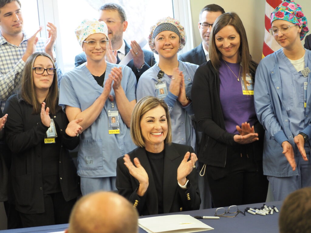 Gov. Kim Reynolds signs into law rural health care, medical residency ...