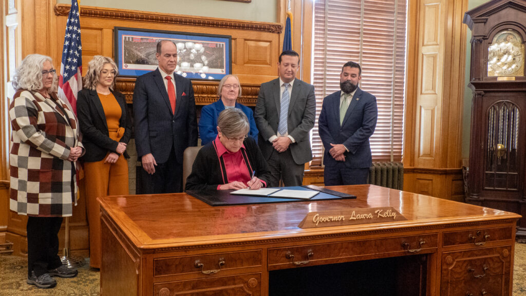 Kansas governor orders federal benefits go to foster kids savings ...
