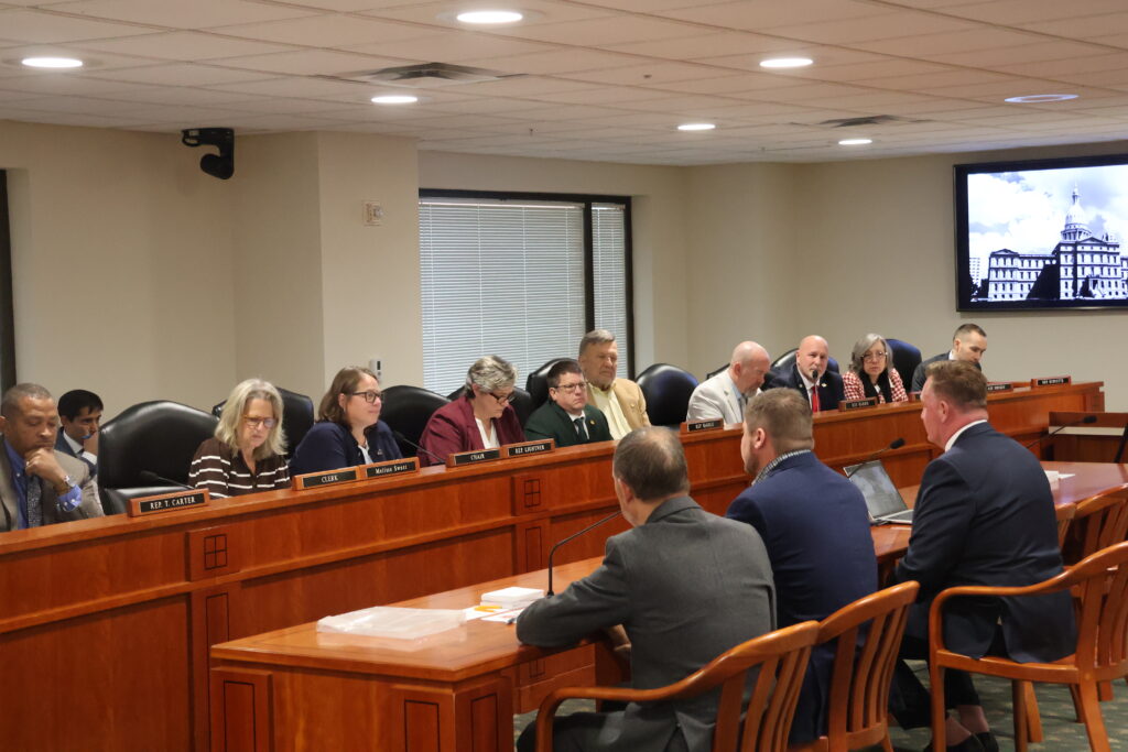 Gun rights groups and gun control advocates debate efforts to lower ...