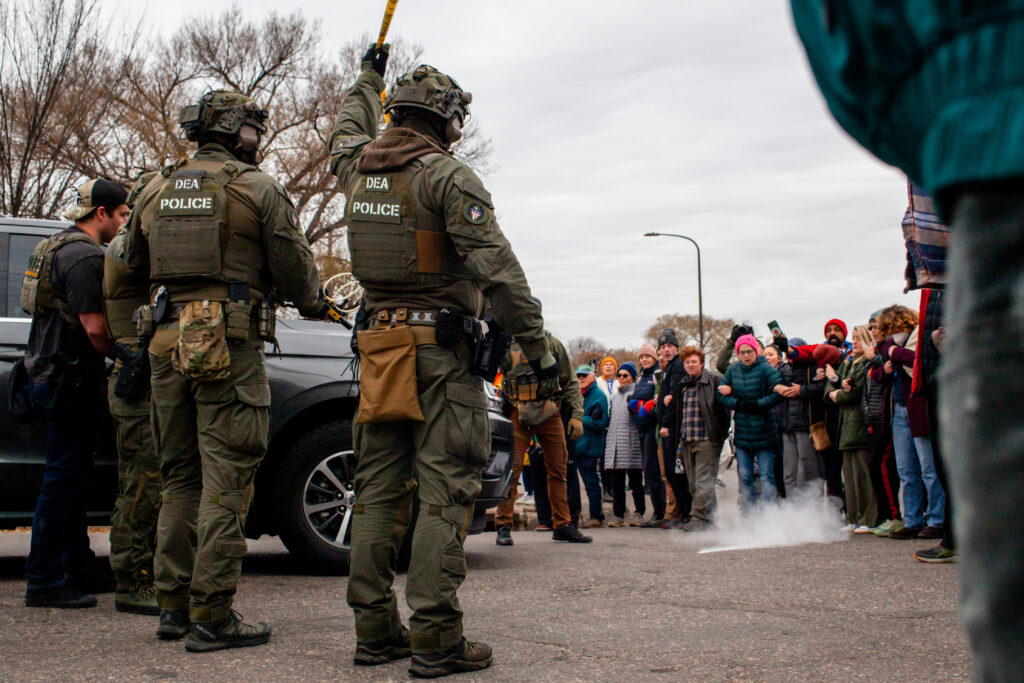 Dozens of federal agents raid St. Paul business, sparking protest ...