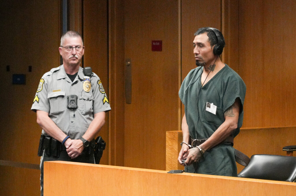 Hearing delayed for undocumented immigrant at center of fight between ...