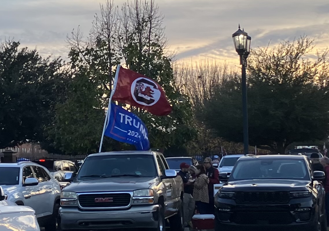 Donald Trump cheered on field at Clemson-USC rivalry game | News From ...