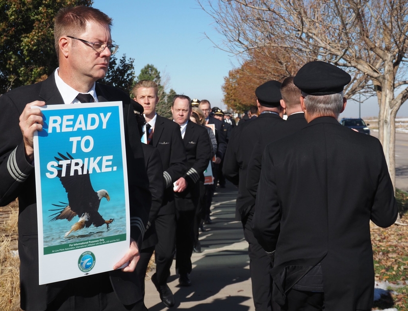 Frontier Airlines pilots picket outside headquarters, seek market ...