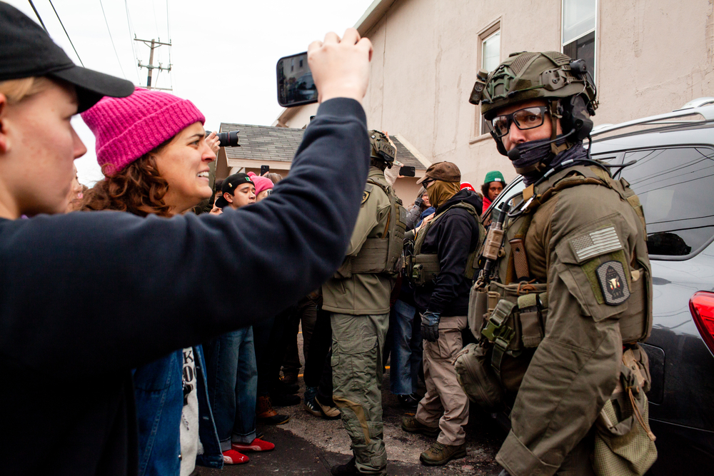 Dozens of federal agents raid St. Paul business, sparking protest ...