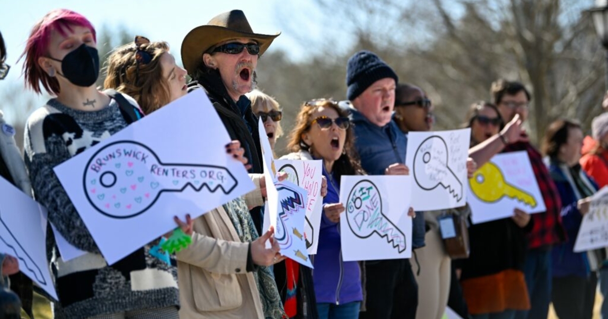 ‘The rent is too damn high’: Housing advocates rally for rent relief ...