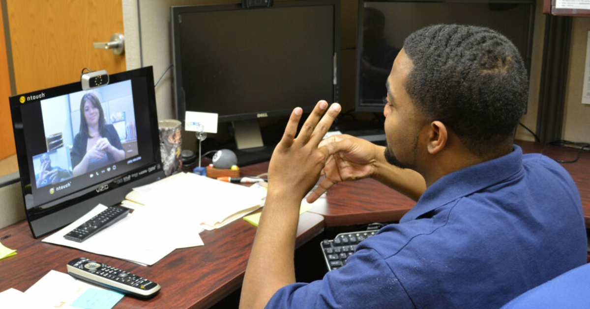 Officials pass out free cue cards to help bridge gap between police ...