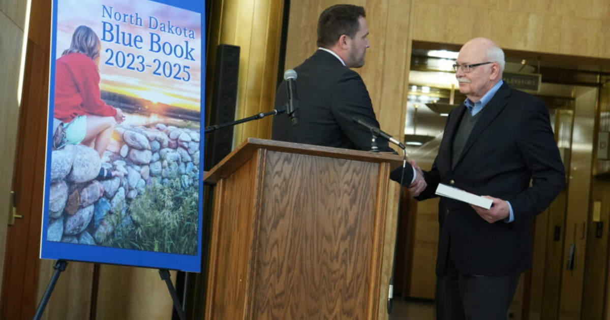 New North Dakota Blue Book released; 1st copy gifted to former ...