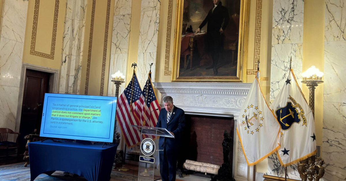 Under a portrait of George Washington, Gov. Dan McKee speaks his truth ...