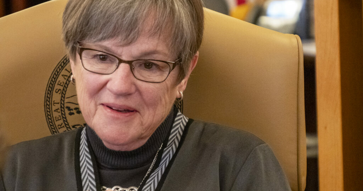 Kelly signs bill exempting servicemembers, spouses from Kansas ...