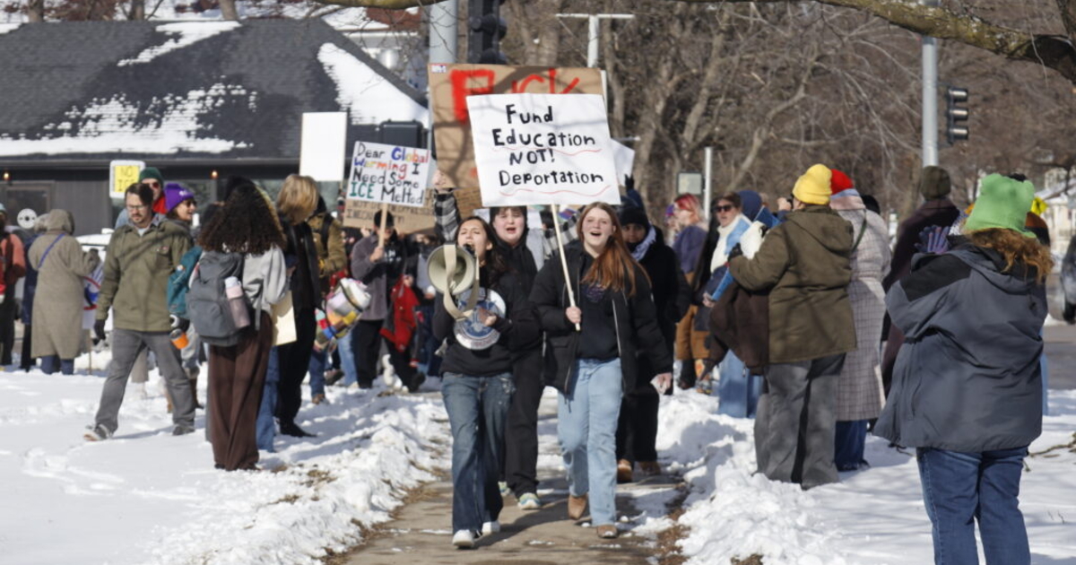 Lawrence high school students and residents march against immigration ...