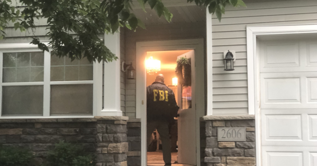 FBI raids suburban homes in connection with attempted juror bribe in ...